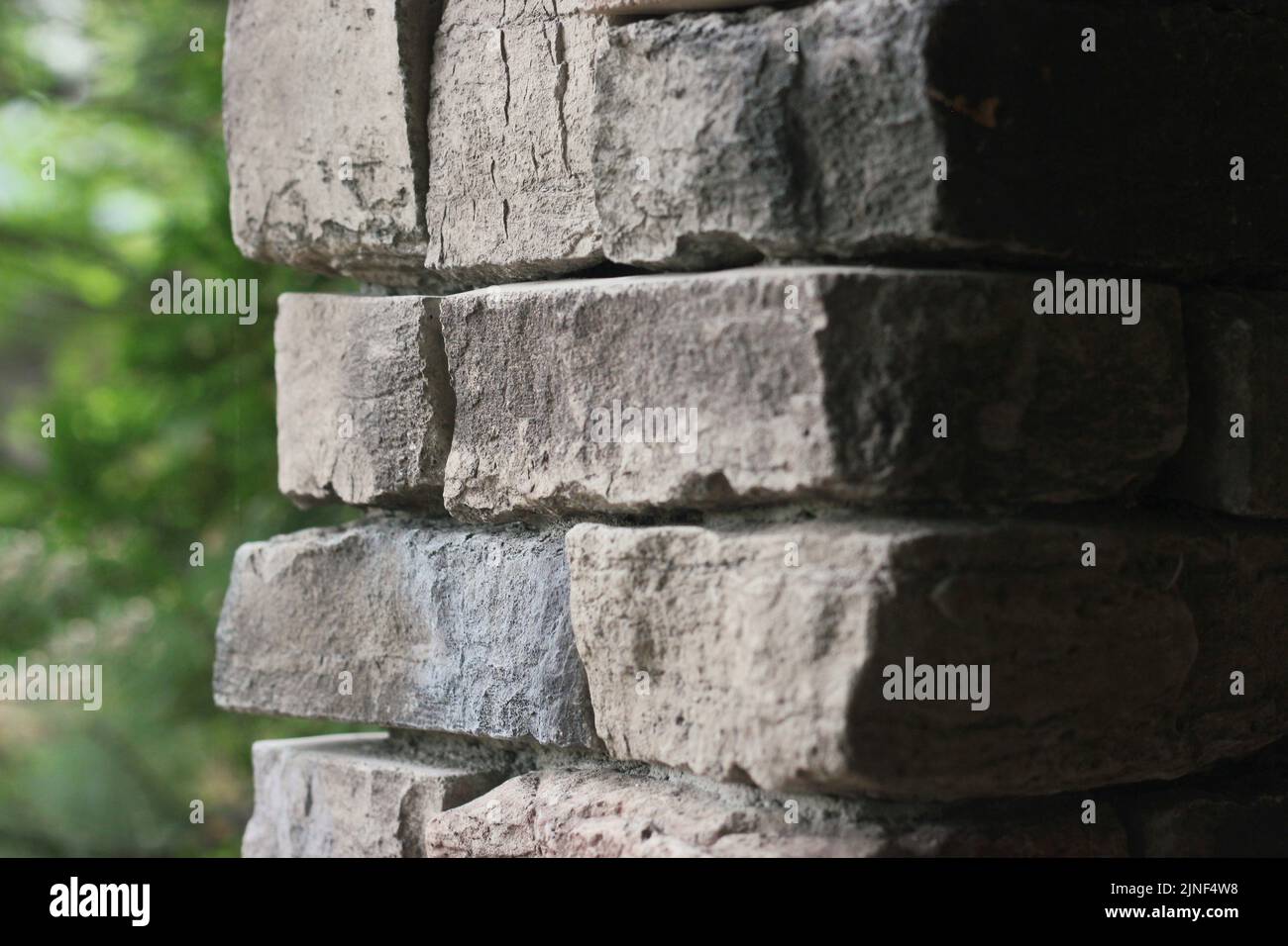 Stone masonry rock wall with layers of stones Stock Photo - Alamy