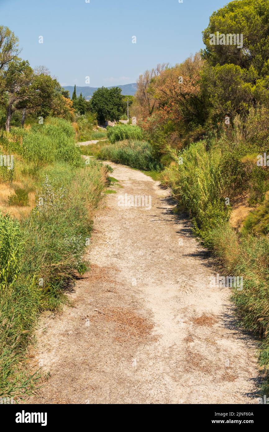 Dried up riverbed of the Coulon river near Cavaillon in southern France ...