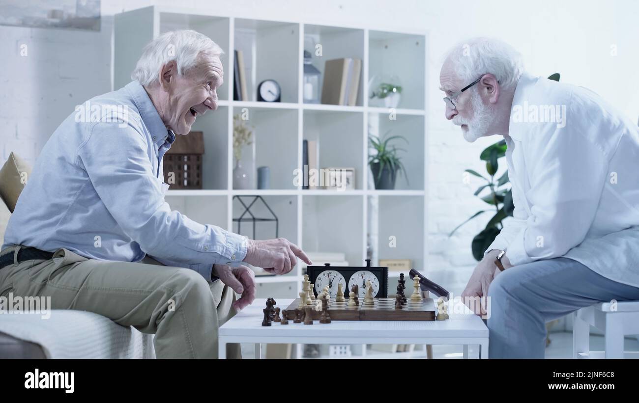 Elderly man laughing pointing hi-res stock photography and images - Alamy