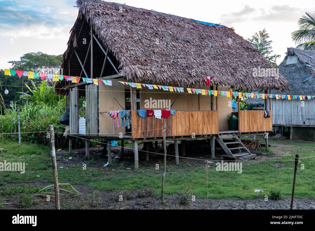 Shacks on stilts are generally the accepted housing in the Peruvian ...
