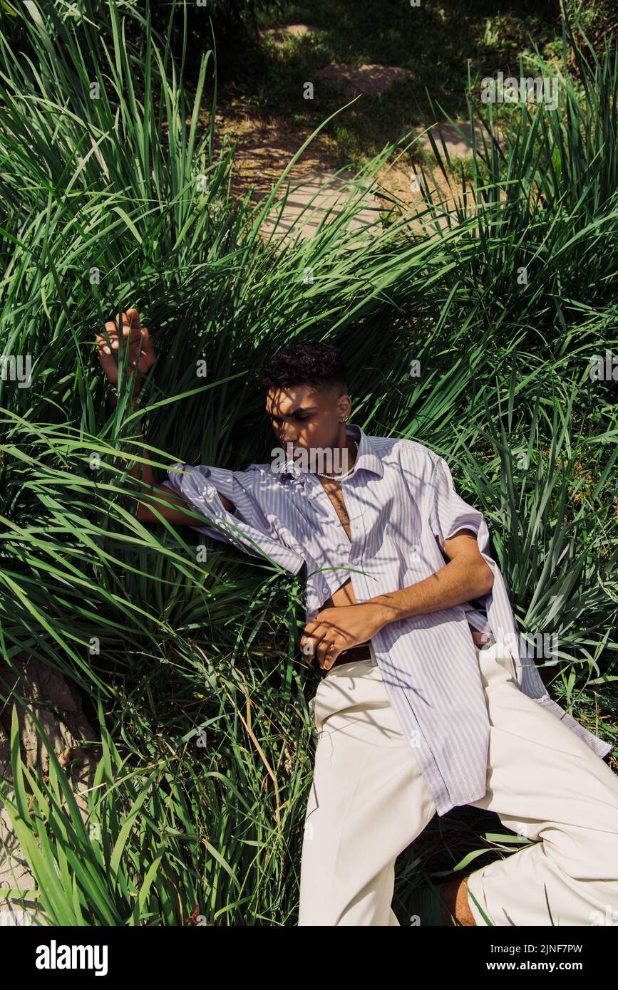Black man sleeping outside hi-res stock photography and images - Alamy