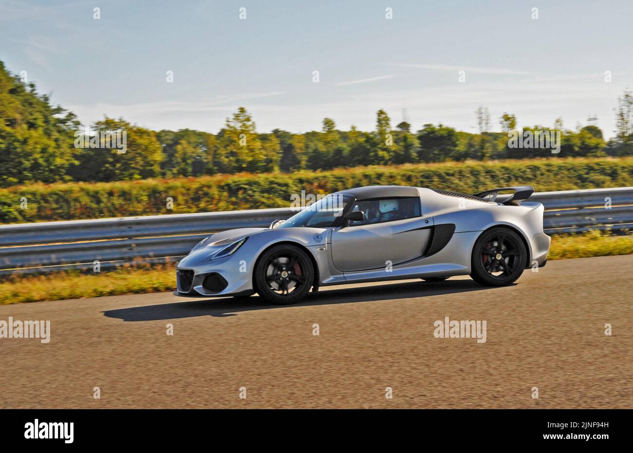 Lotus Exide sports car at track day France Stock Photo - Alamy