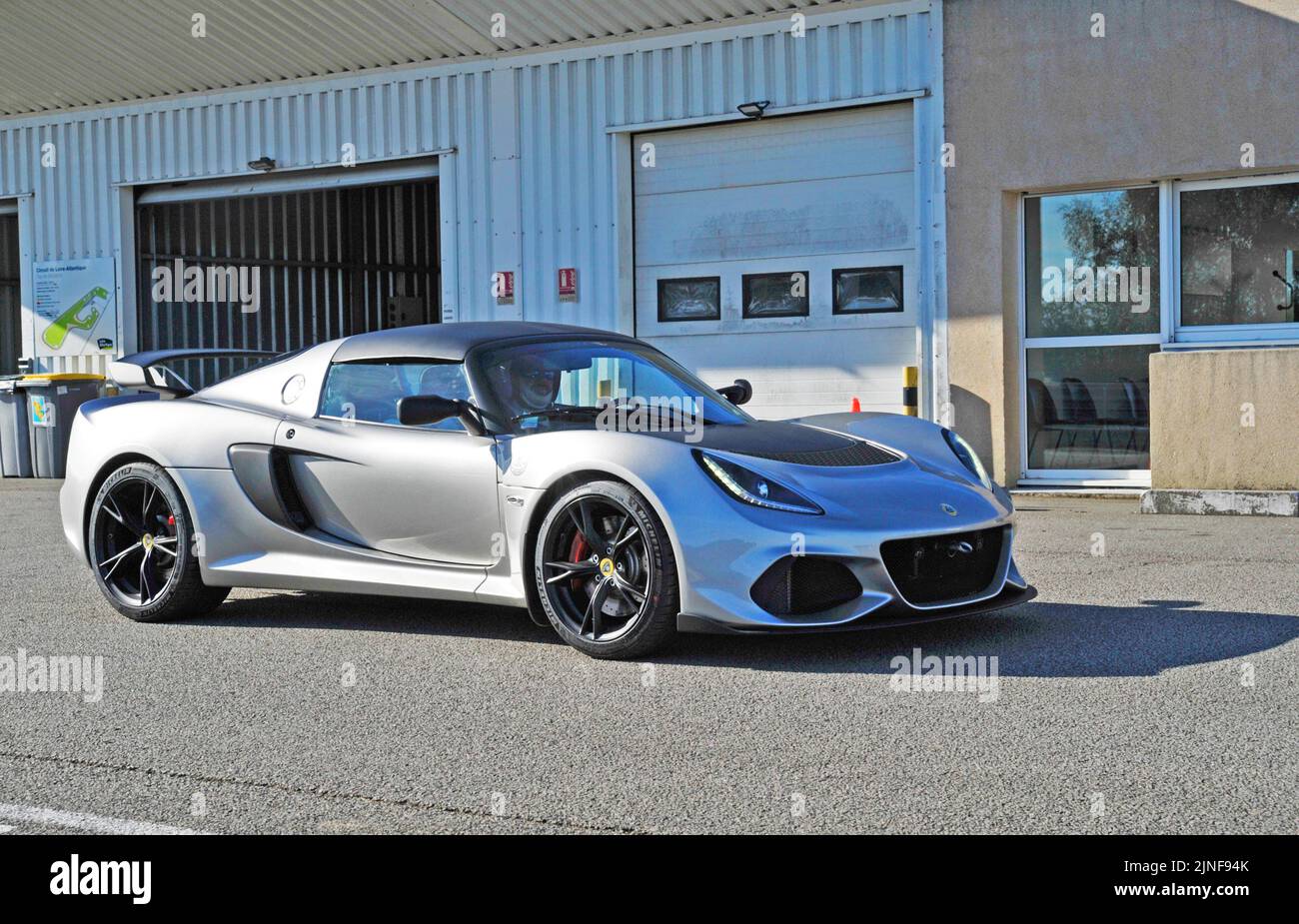 Lotus Exide sports car at track day France Stock Photo - Alamy