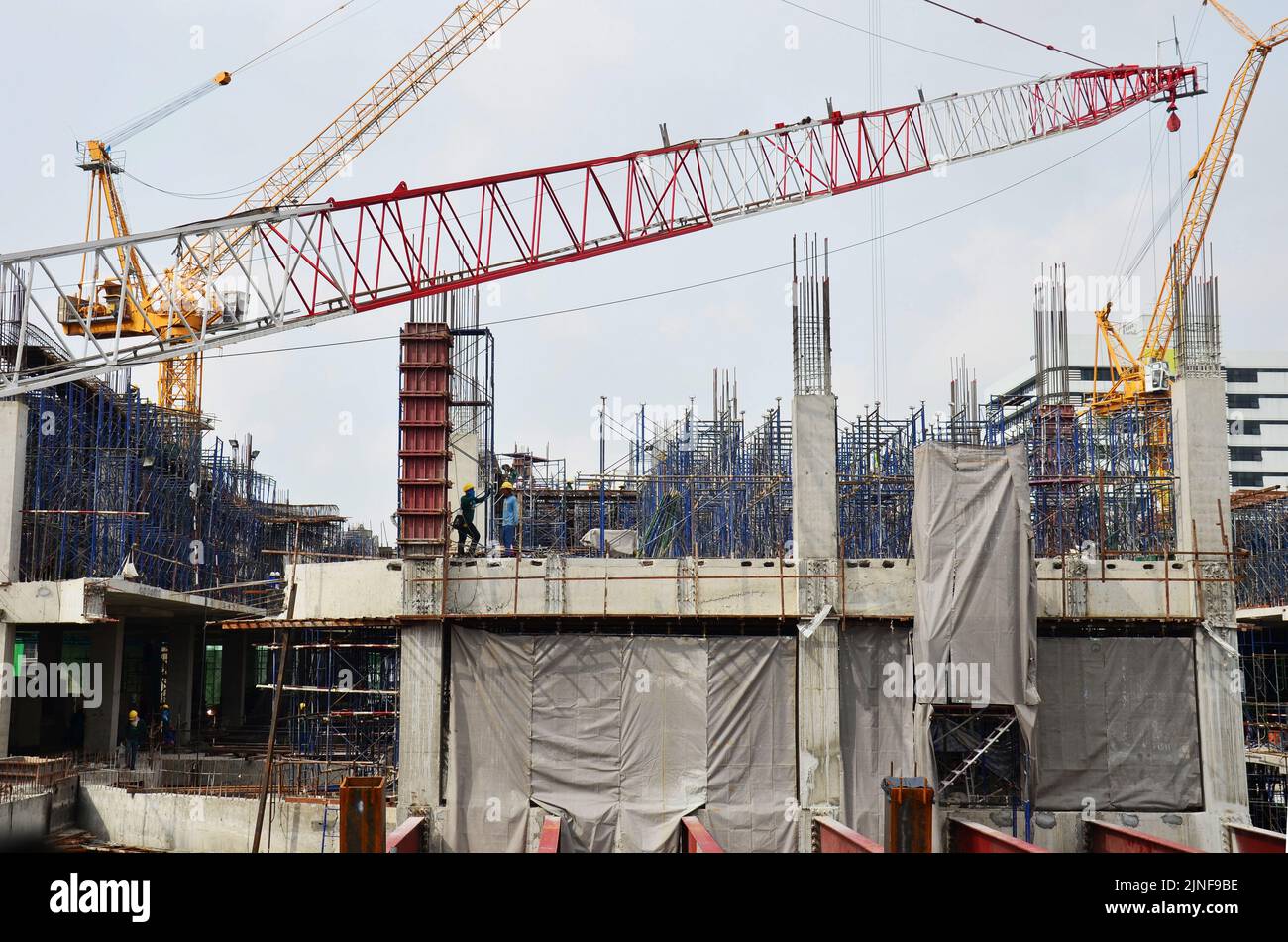 Asian labor people and thai labour workers use machine and heavy ...