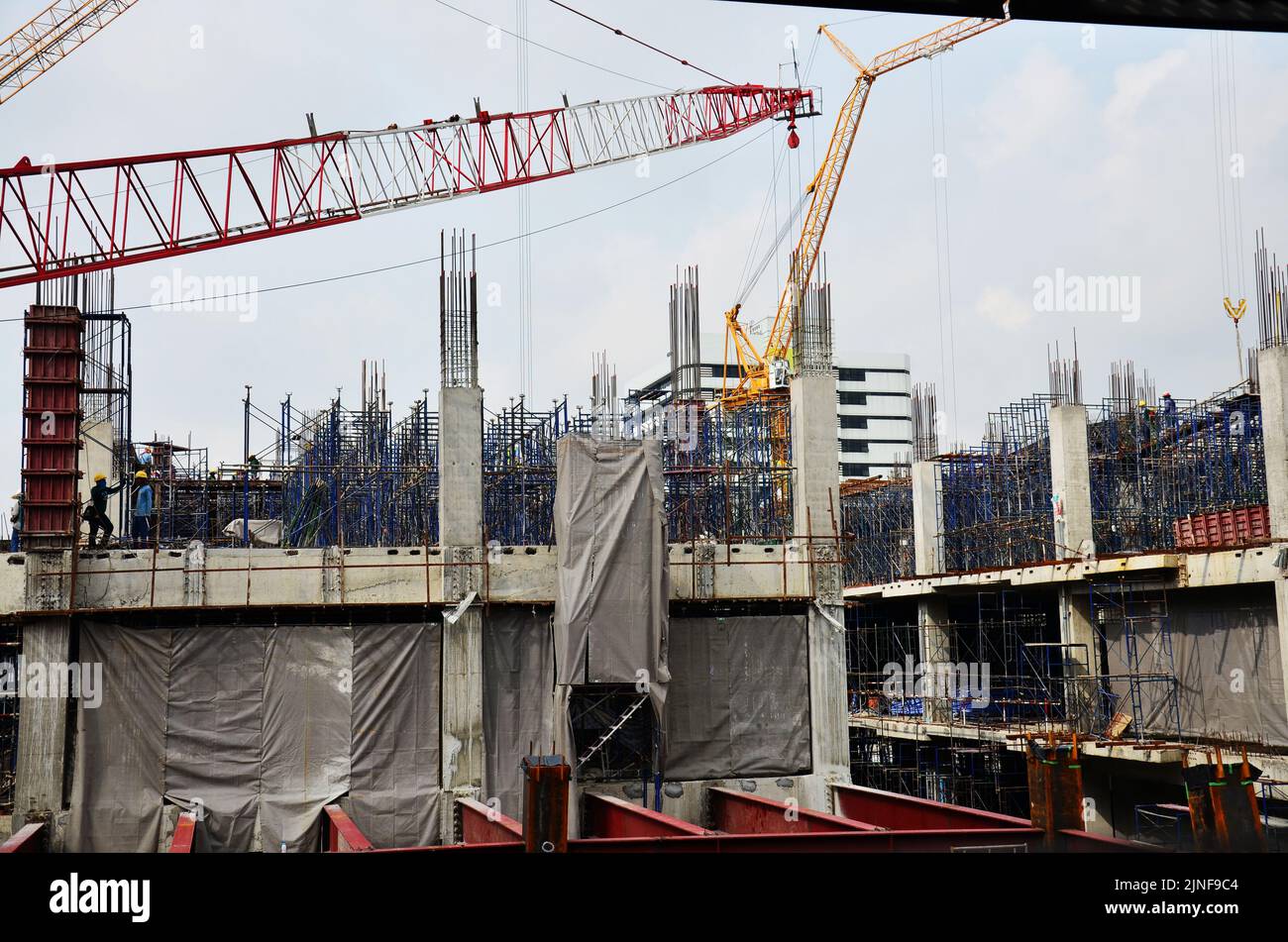 Asian labor people and thai labour workers use machine and heavy ...