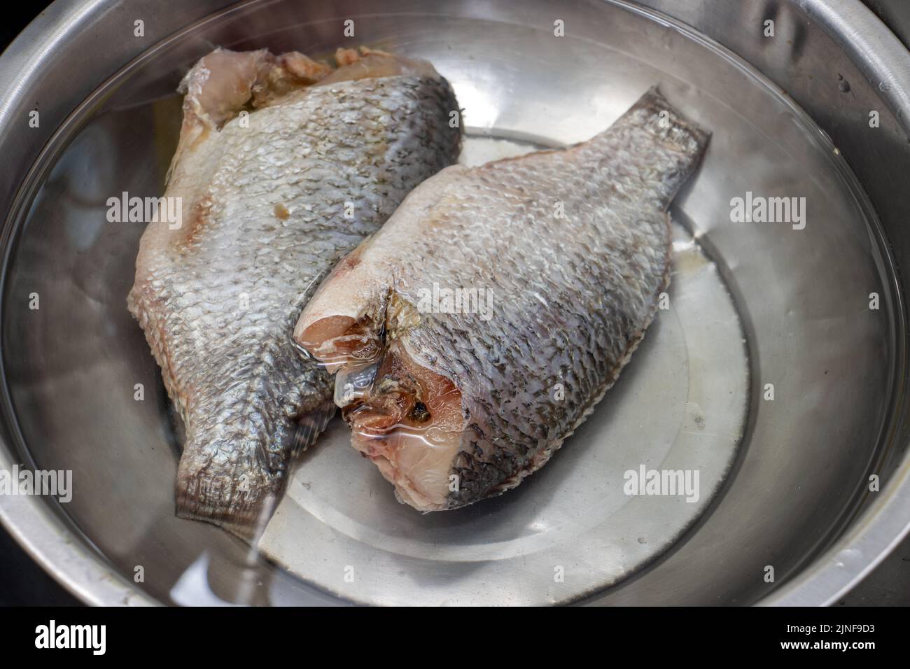 Cooking fish in water hi-res stock photography and images - Alamy