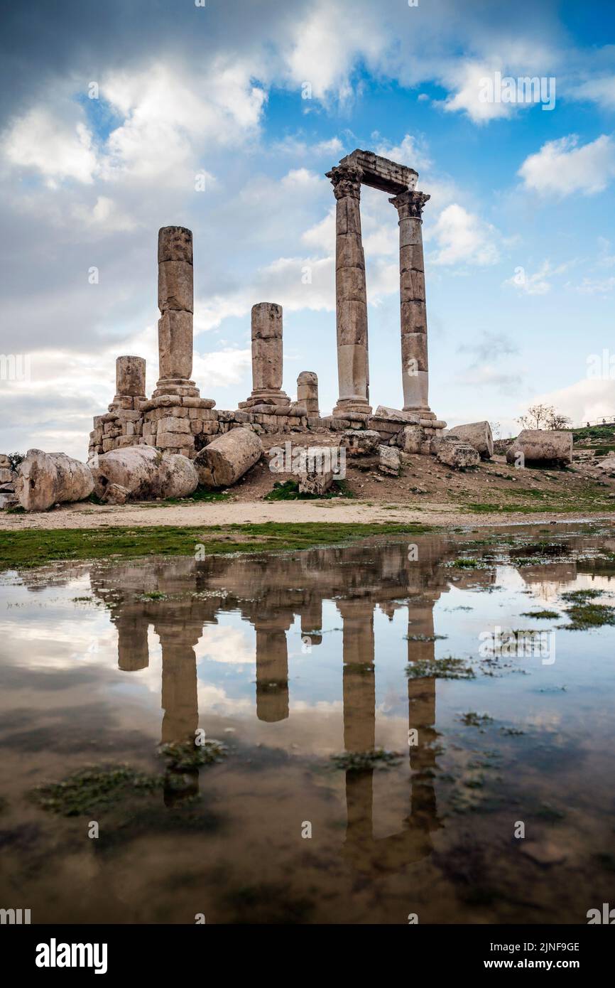 The Temple of Hercules reflected on a water pond, Amman Citadel, Amman ...