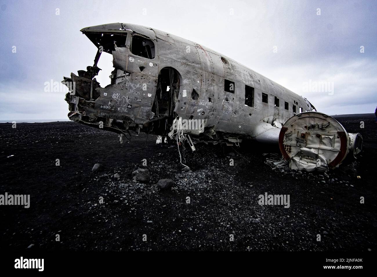 A view of an old, crashed plane on a cloudy day Stock Photo - Alamy