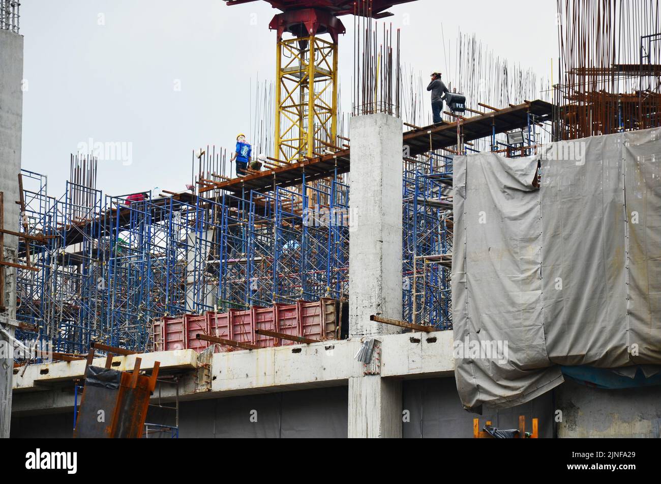 Asian labor people and thai labour worker use machine and heavy ...