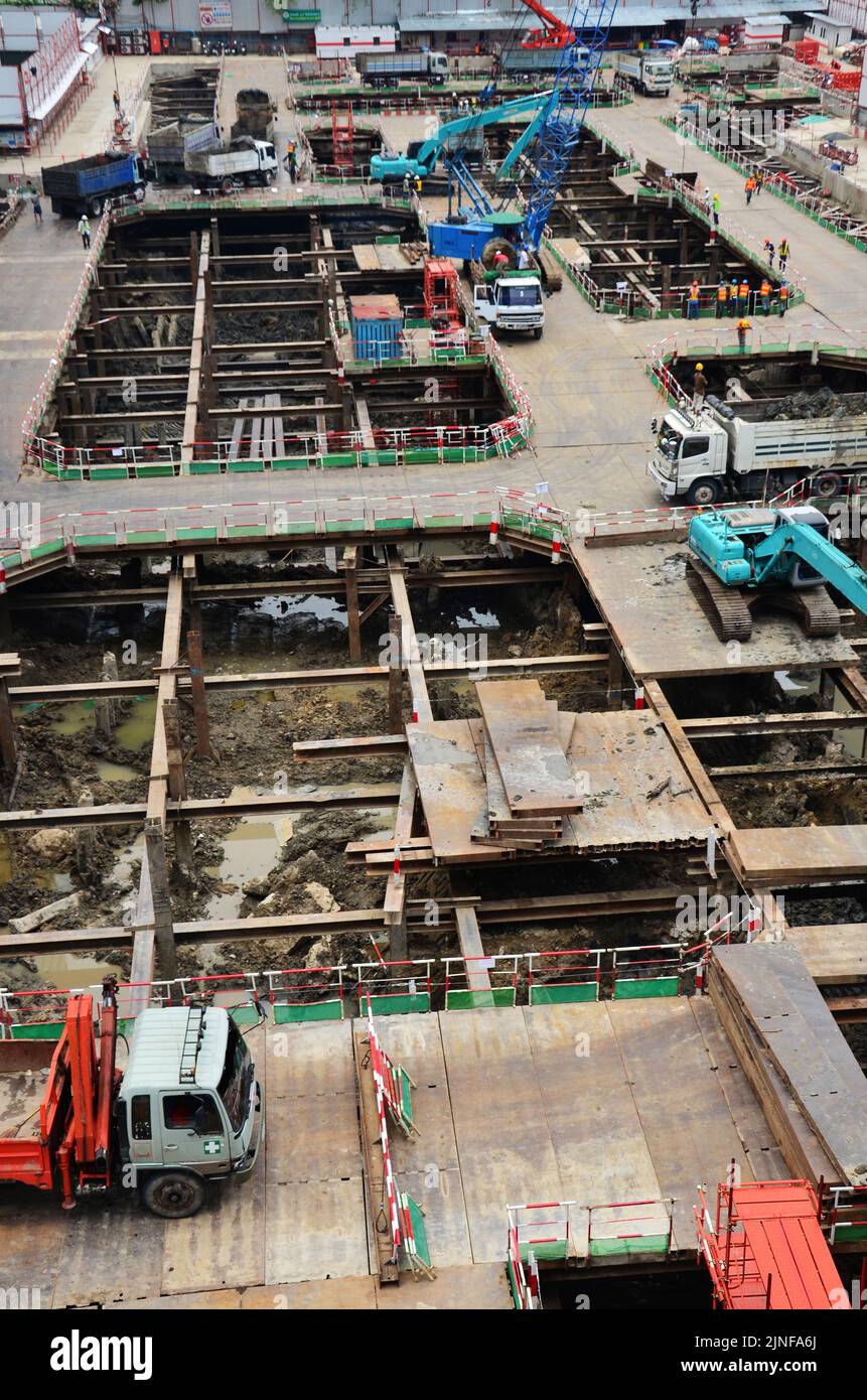 Asian labor people and thai labour worker use machine and heavy ...