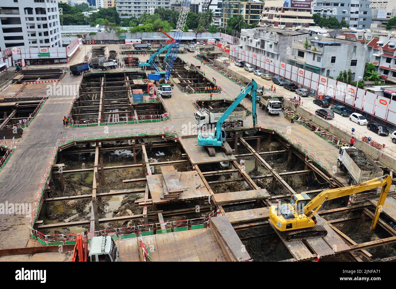 Asian labor people and thai labour worker use machine and heavy ...