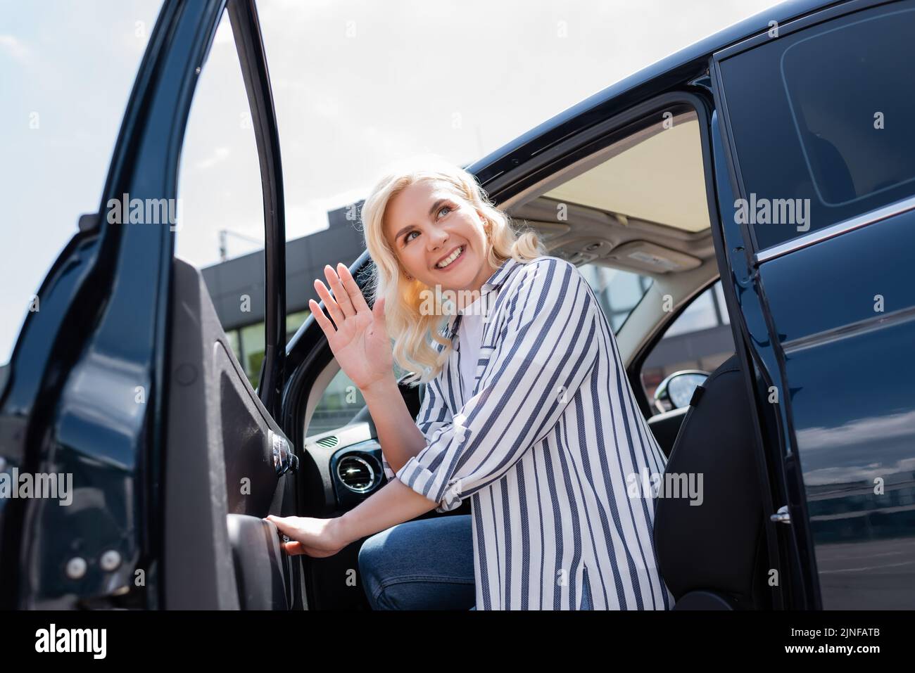 Car hand waving hi-res stock photography and images - Alamy