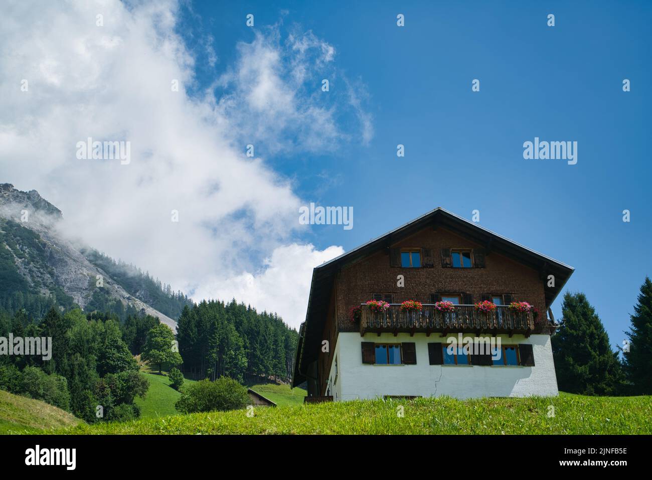 Detached house in the wonderful features of the Austrian Alps Stock ...