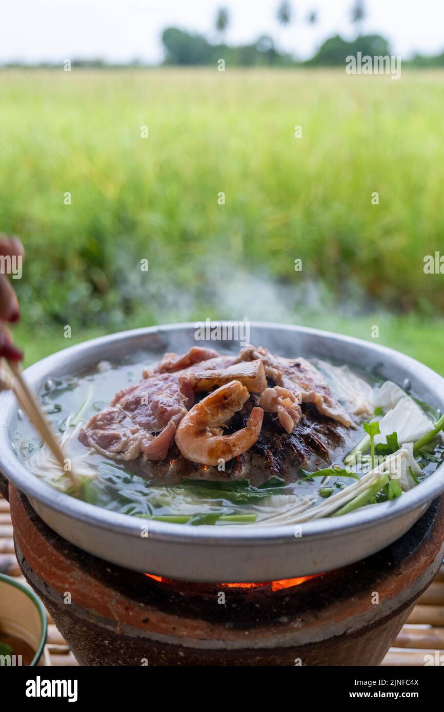 Korean bbq on vacation at a homestay in Thailand, eco farm with green ...