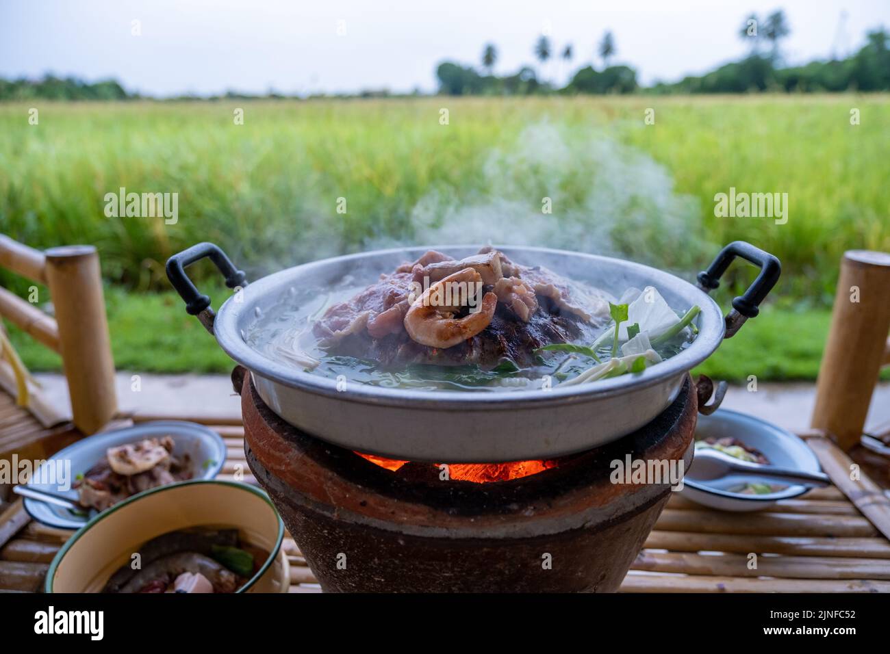 Korean bbq on vacation at a homestay in Thailand, eco farm with green ...