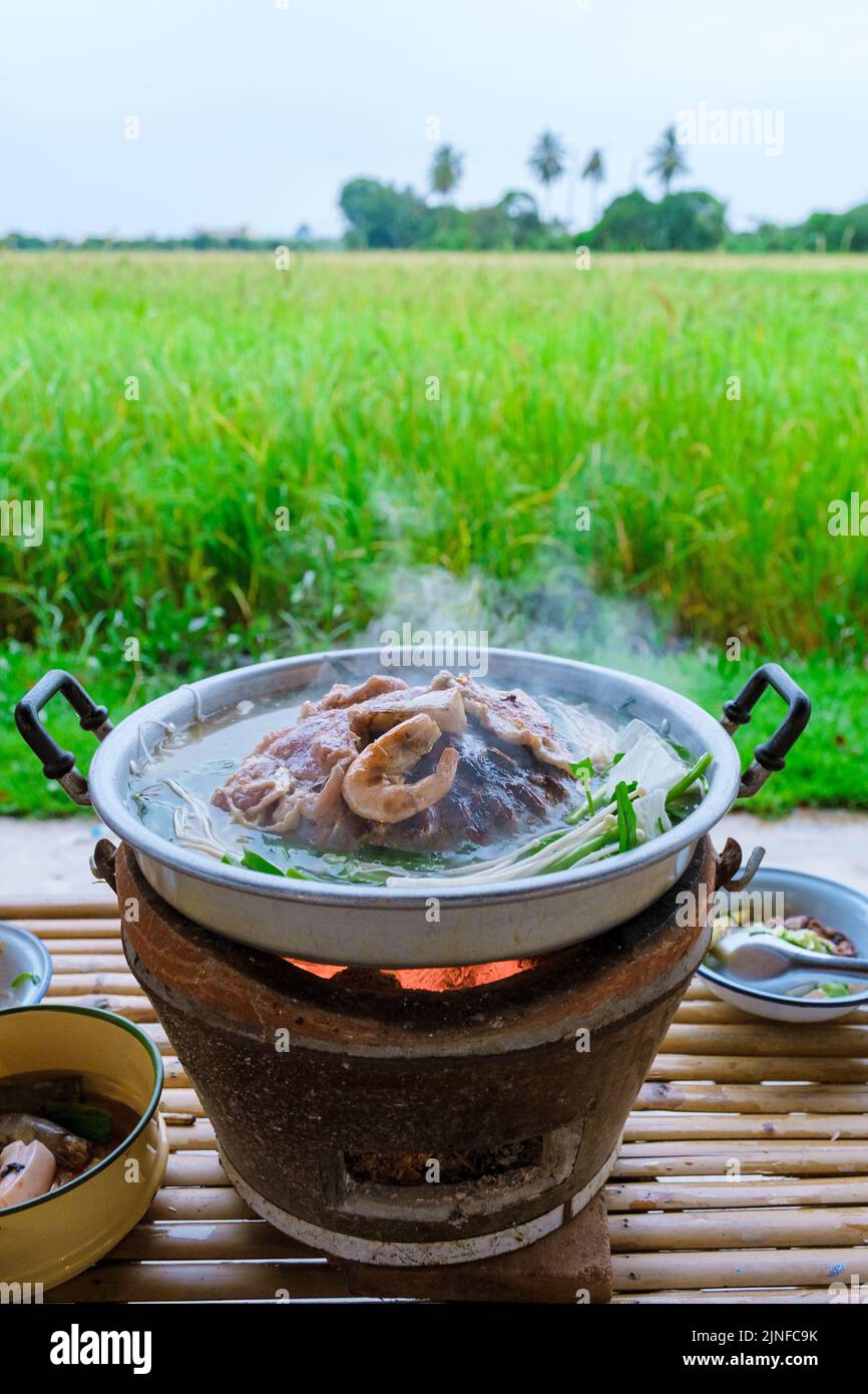 Korean bbq on vacation at a homestay in Thailand, eco farm with green ...