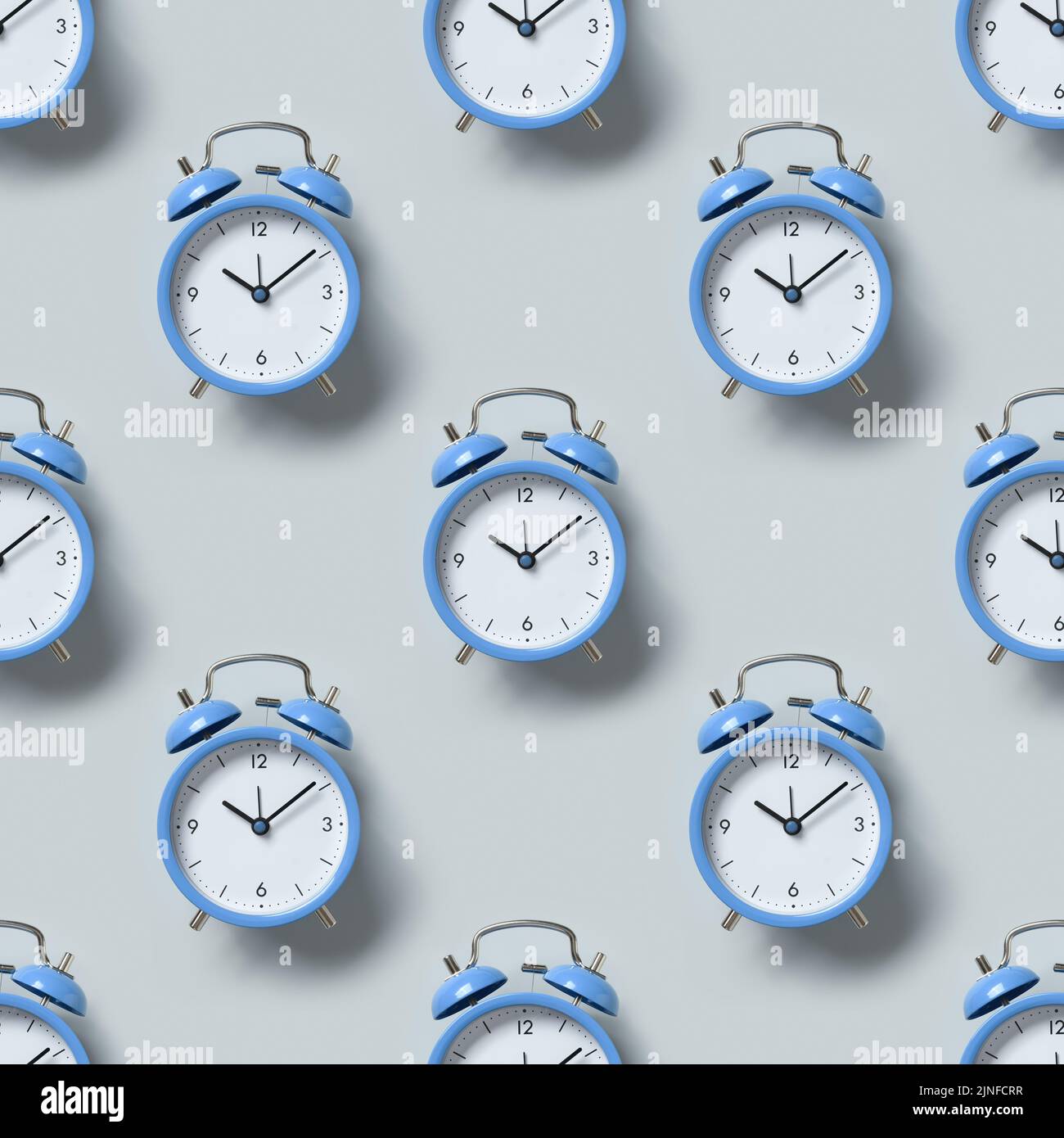 Seamless pattern of old-fashioned blue alarm clocks on blue background ...