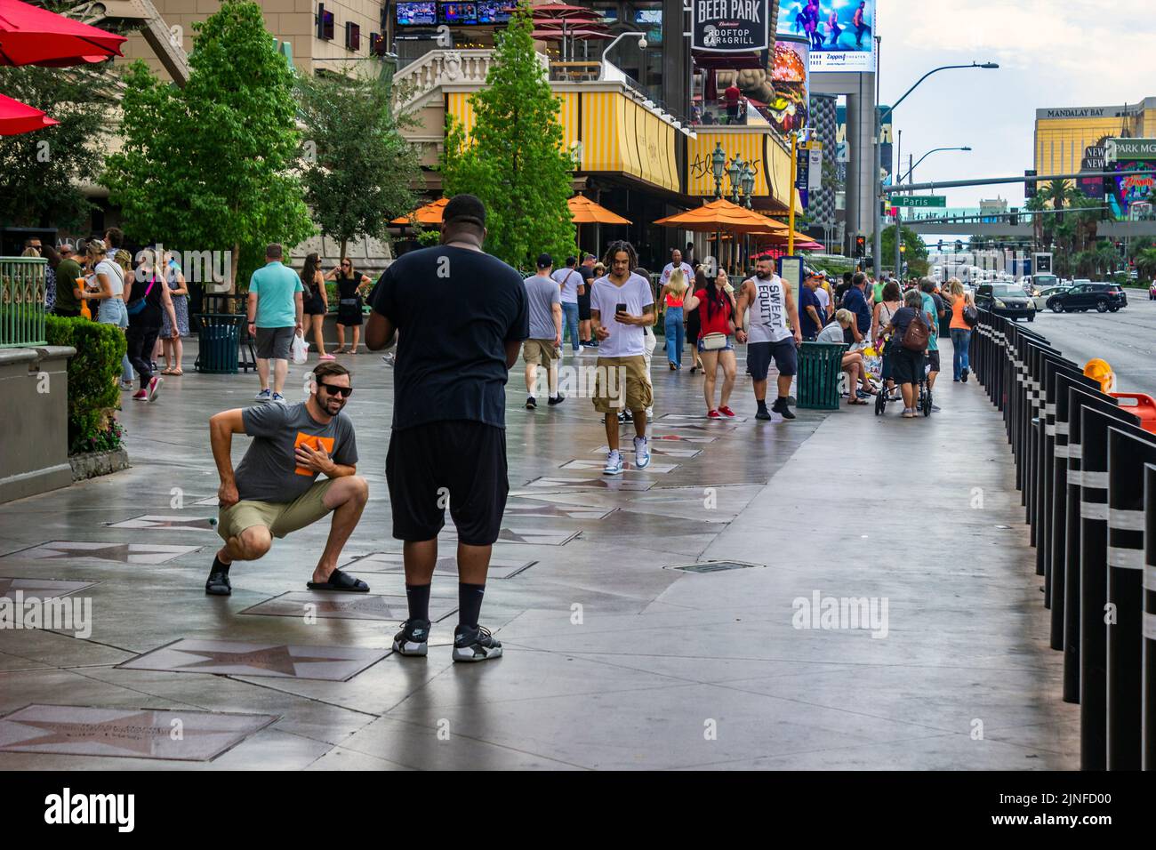 A man poses for a picture at Paris Las Vegas Hotel and Casino on the ...