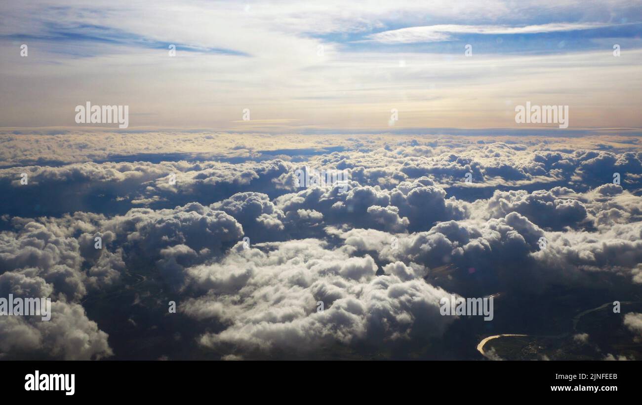 Flying through beautiful thick fluffy clouds. Soft white clouds moving ...