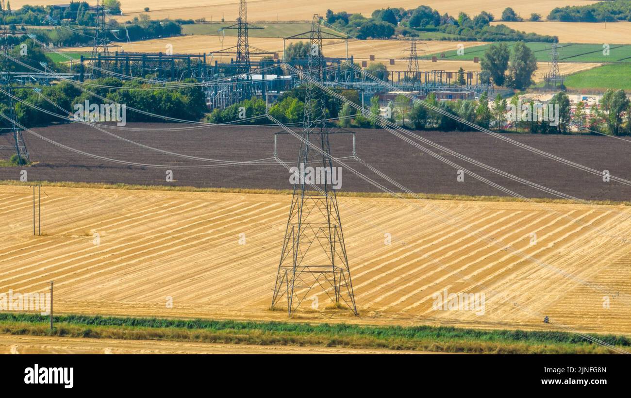 Generic picture dated August 10th shows electricity pylons between a ...