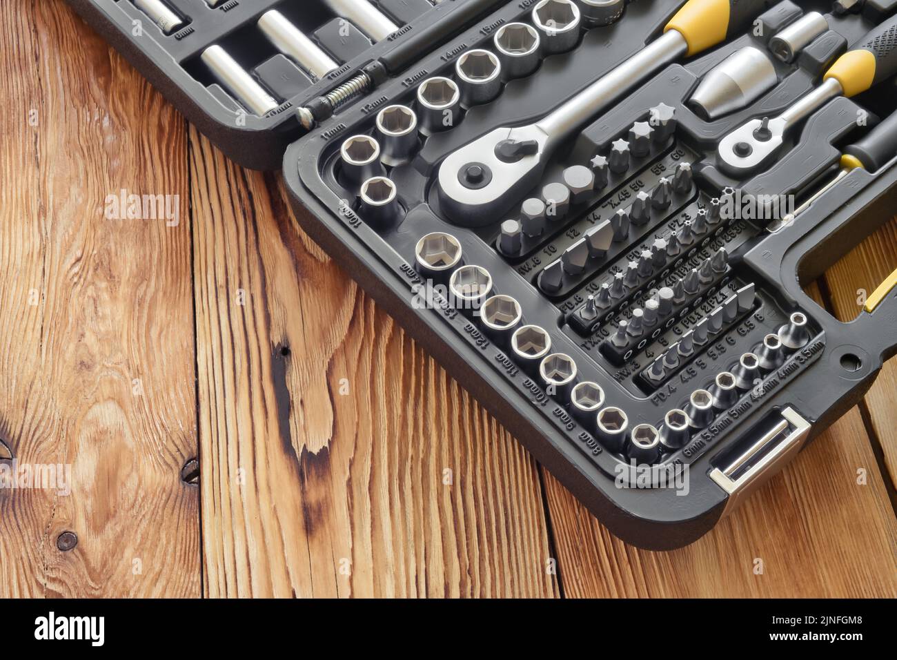 Mechanical hand tool kit on wooden table background. Fragment of ...
