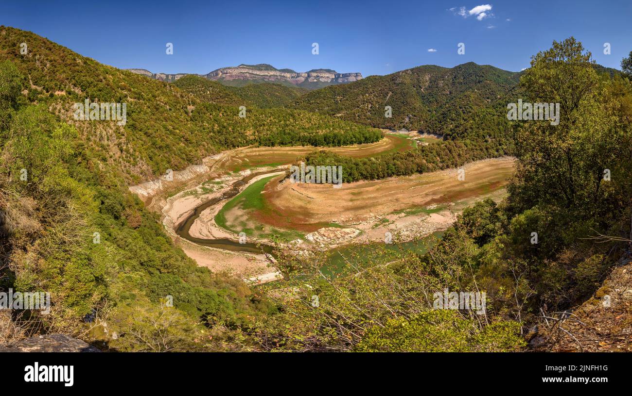 Dry tail meander of the Susqueda reservoir during the summer drought of ...