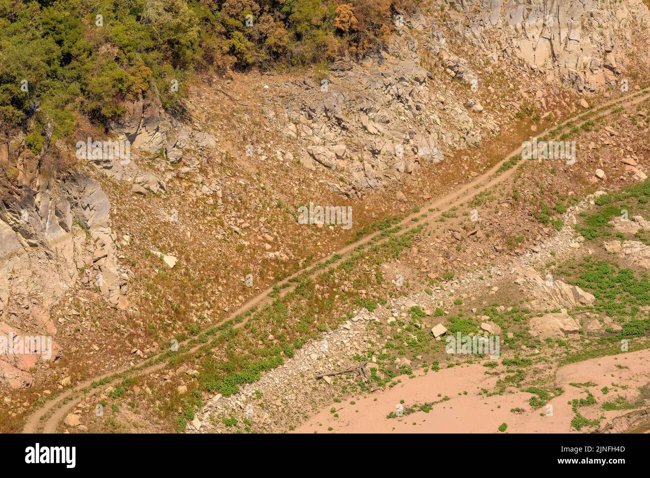 Dry tail meander of the Susqueda reservoir during the summer drought of ...