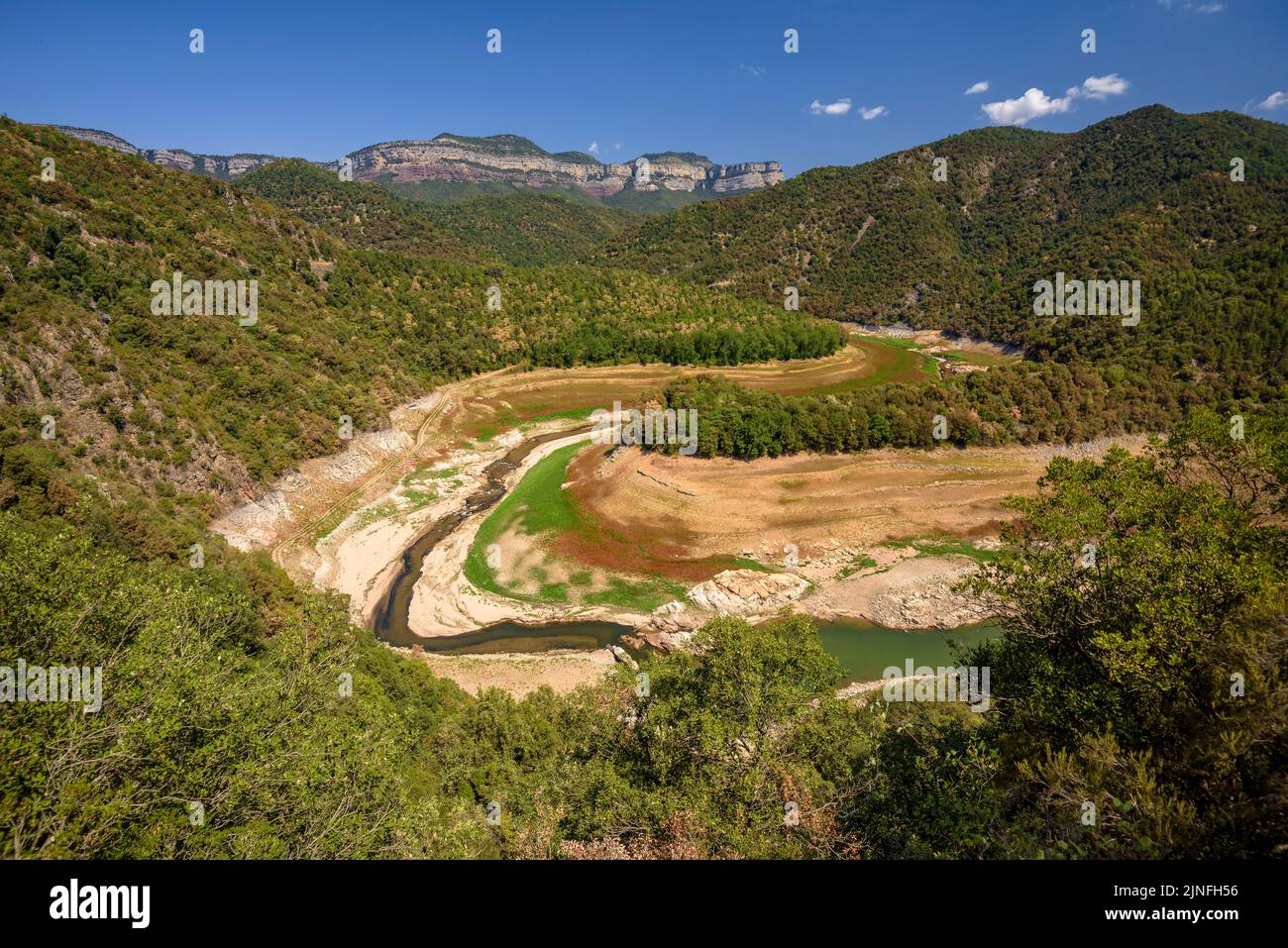 Dry tail meander of the Susqueda reservoir during the summer drought of ...