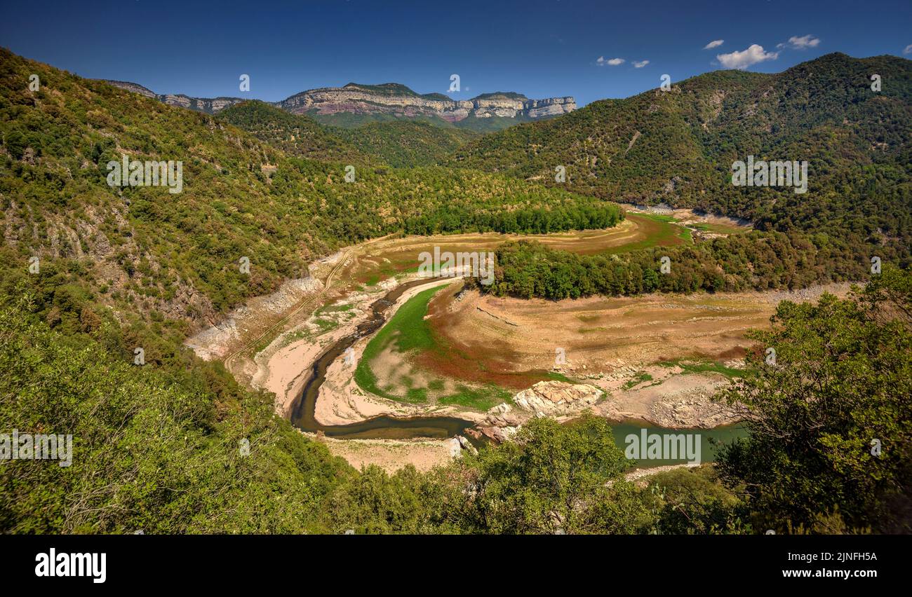 Dry tail meander of the Susqueda reservoir during the summer drought of ...