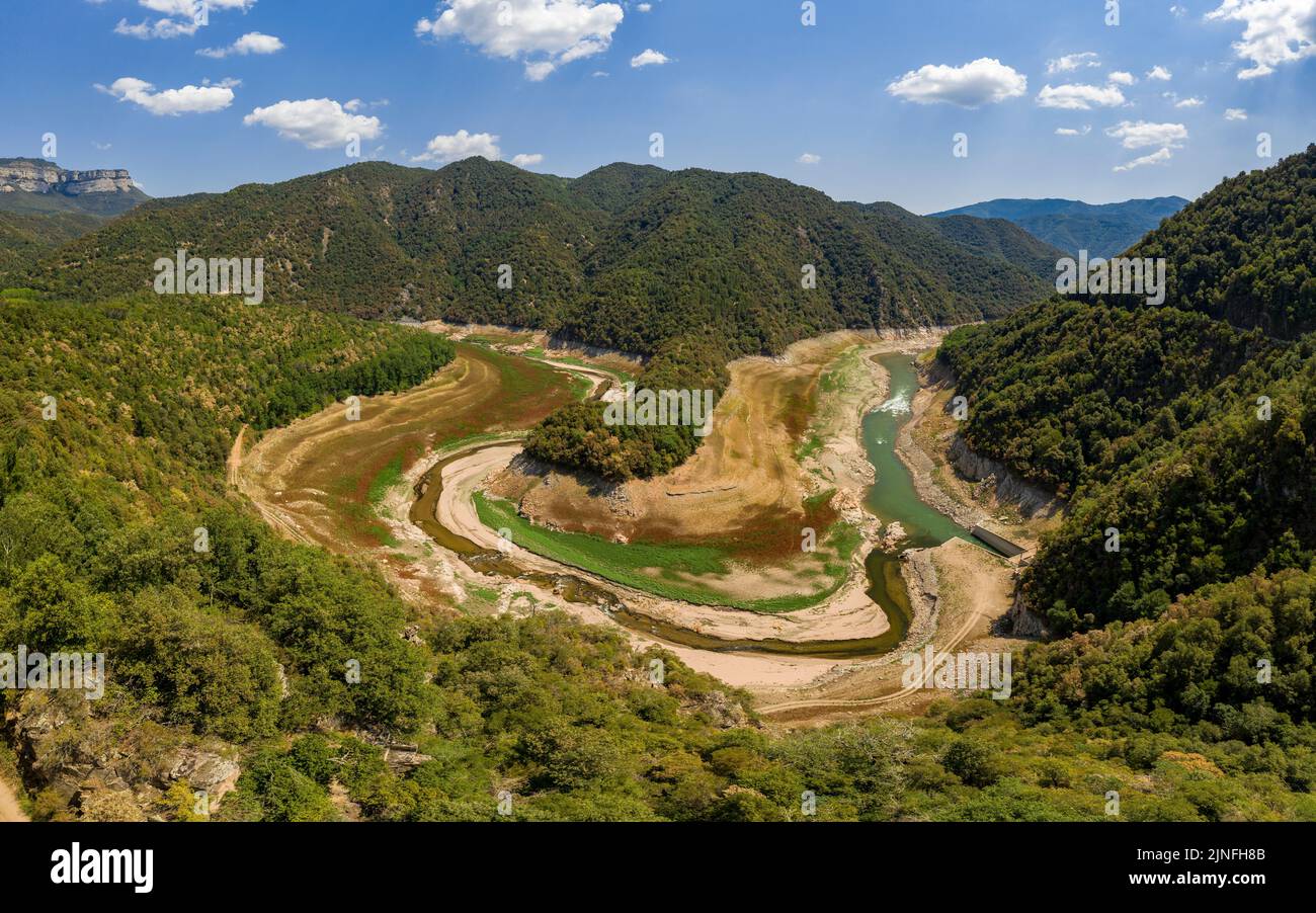 Dry tail meander of the Susqueda reservoir during the summer drought of ...