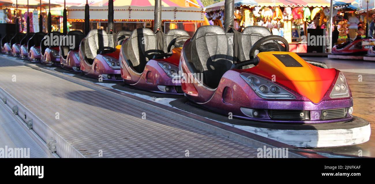 A Line of Dodgem Cars at a Fun Fair Amusement Park Stock Photo - Alamy