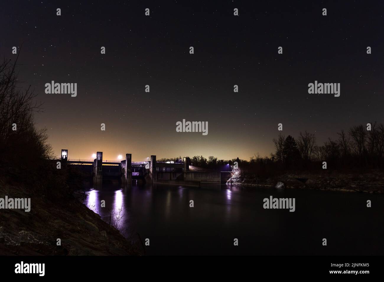 A Hydroelectric dam in rivers night stairs Stock Photo - Alamy