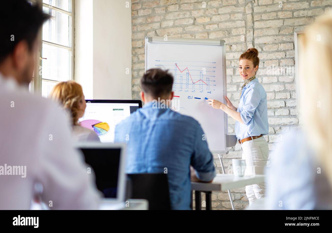 Group of happy multiethnic business people cooperating, working on ...