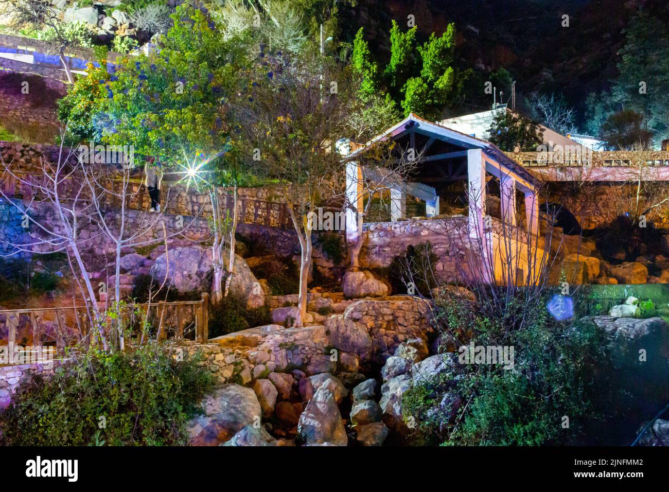 A hand washing public laundry in Chefchaouen by night, Morocco Stock ...