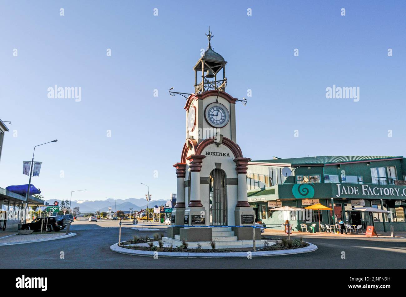 The Clock Tower is on a roundabout in Well Street, Hokitika on the west ...