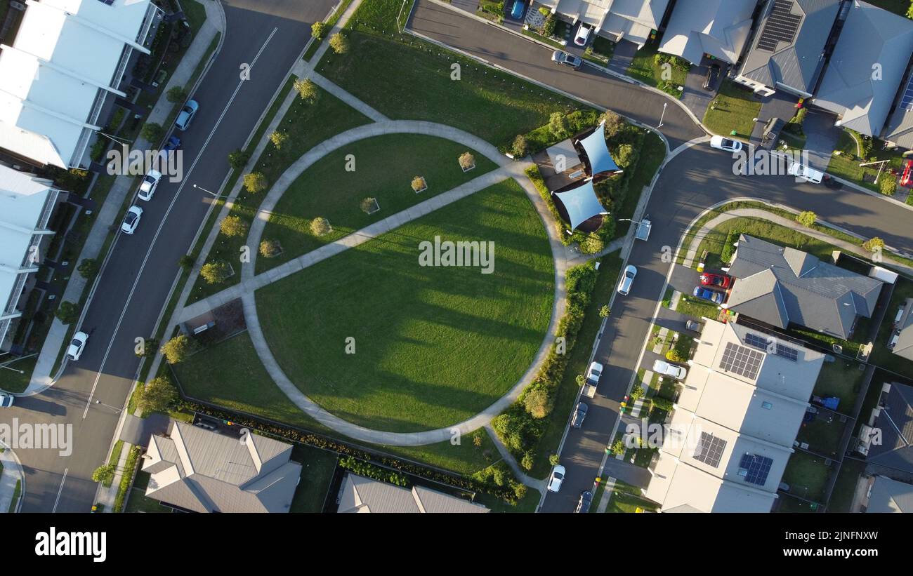 The aerial view of the green lawn with a circular pathway Stock Photo ...