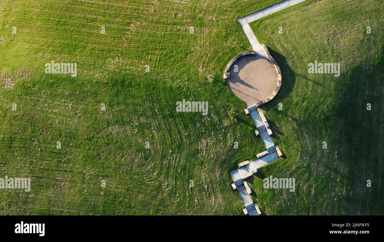 The aerial view of the green lawn with a circular pathway Stock Photo ...
