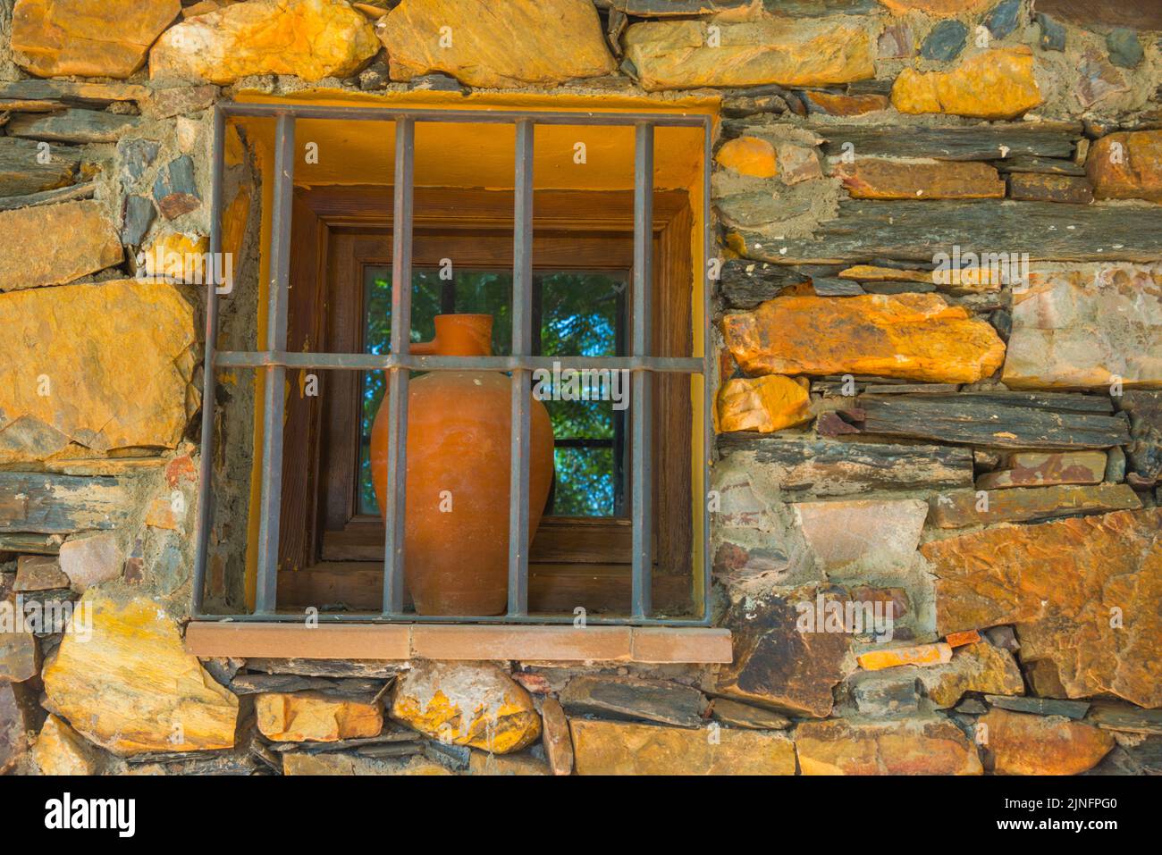 Clay pot in rustic window Stock Photo - Alamy