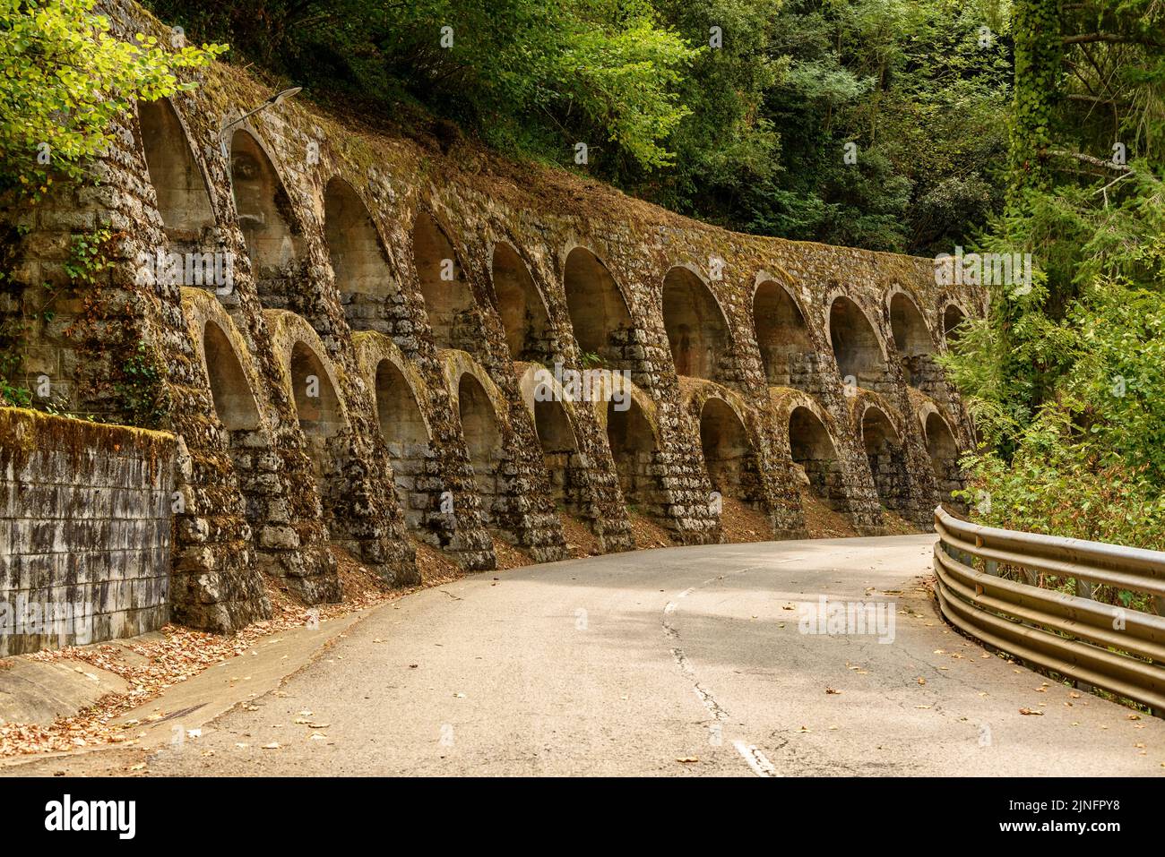 Reinforcement arches on the road leaving the village of Osor towards ...