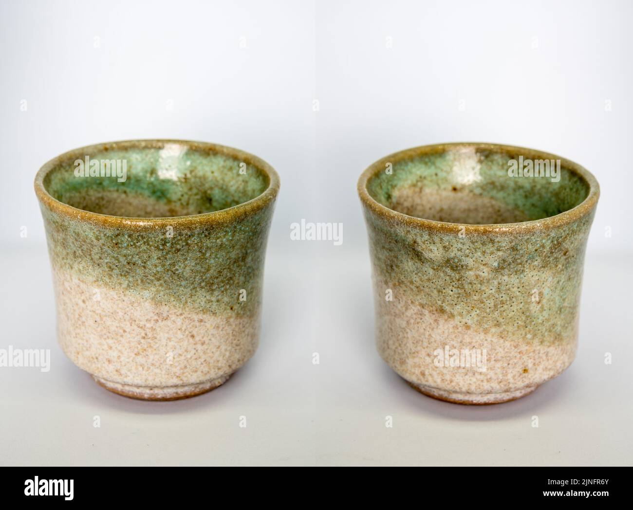 The ceramic cup has been adapted for planting small pot plants Stock ...