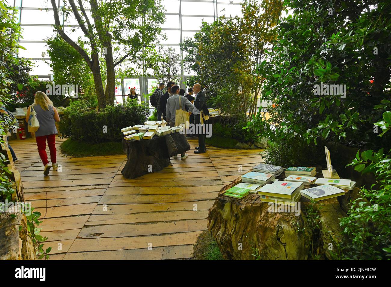 "The wood of writers" bucolic setting up of a publishing house booth at ...