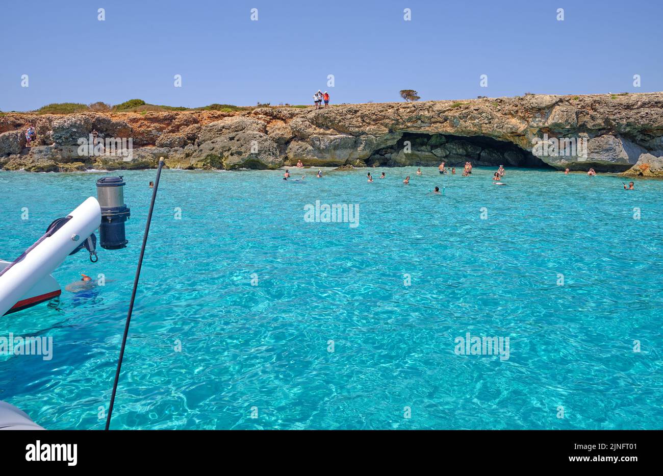Menorca, Spain: Beautiful bay with sailing boat catamaran Stock Photo ...