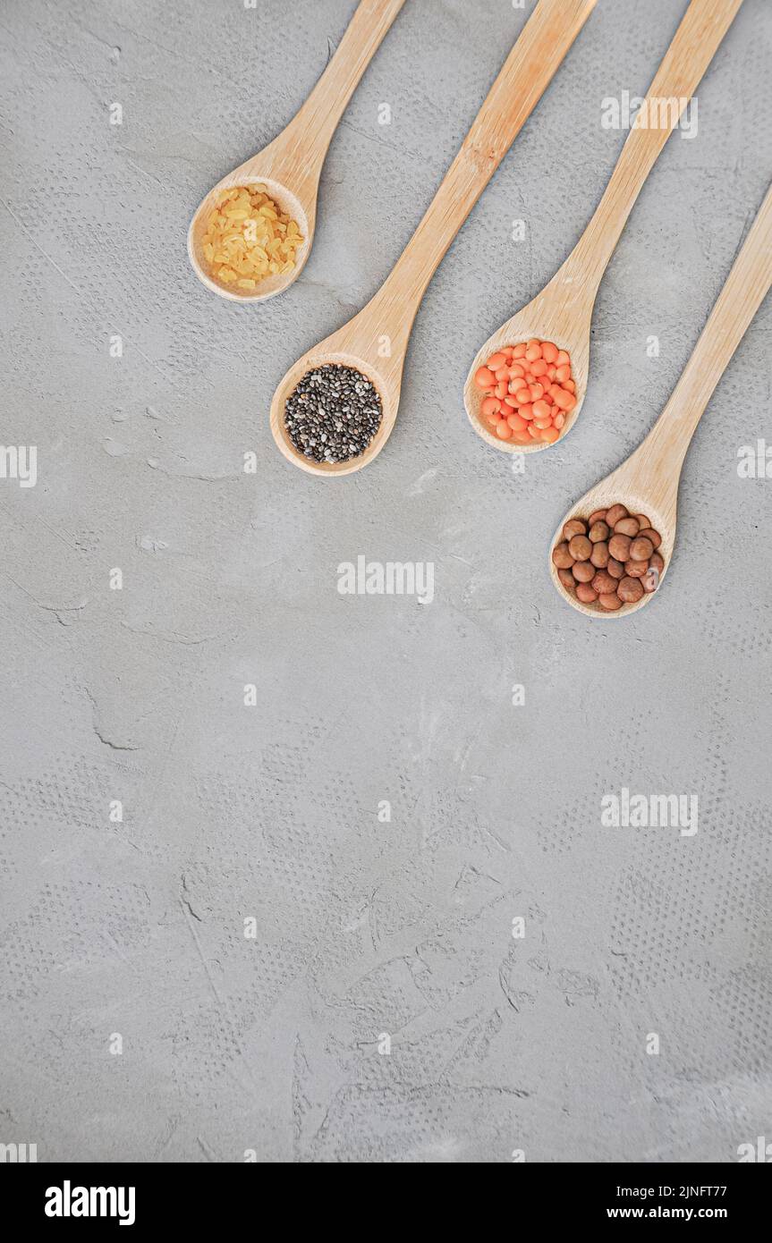 Different or various types of dry beans or dried legumes in wooden ...