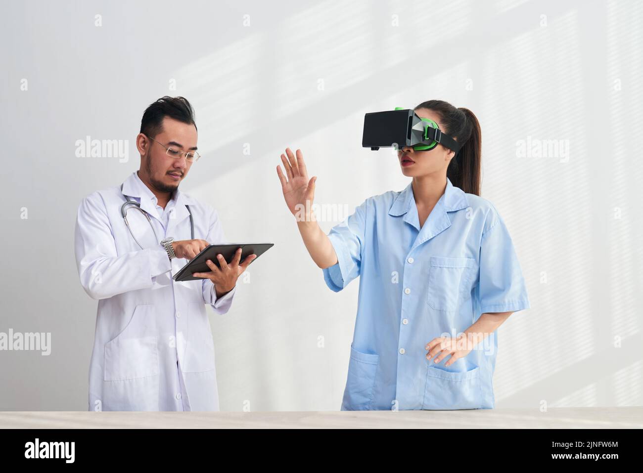 Medical team trying new virtual reality application Stock Photo - Alamy