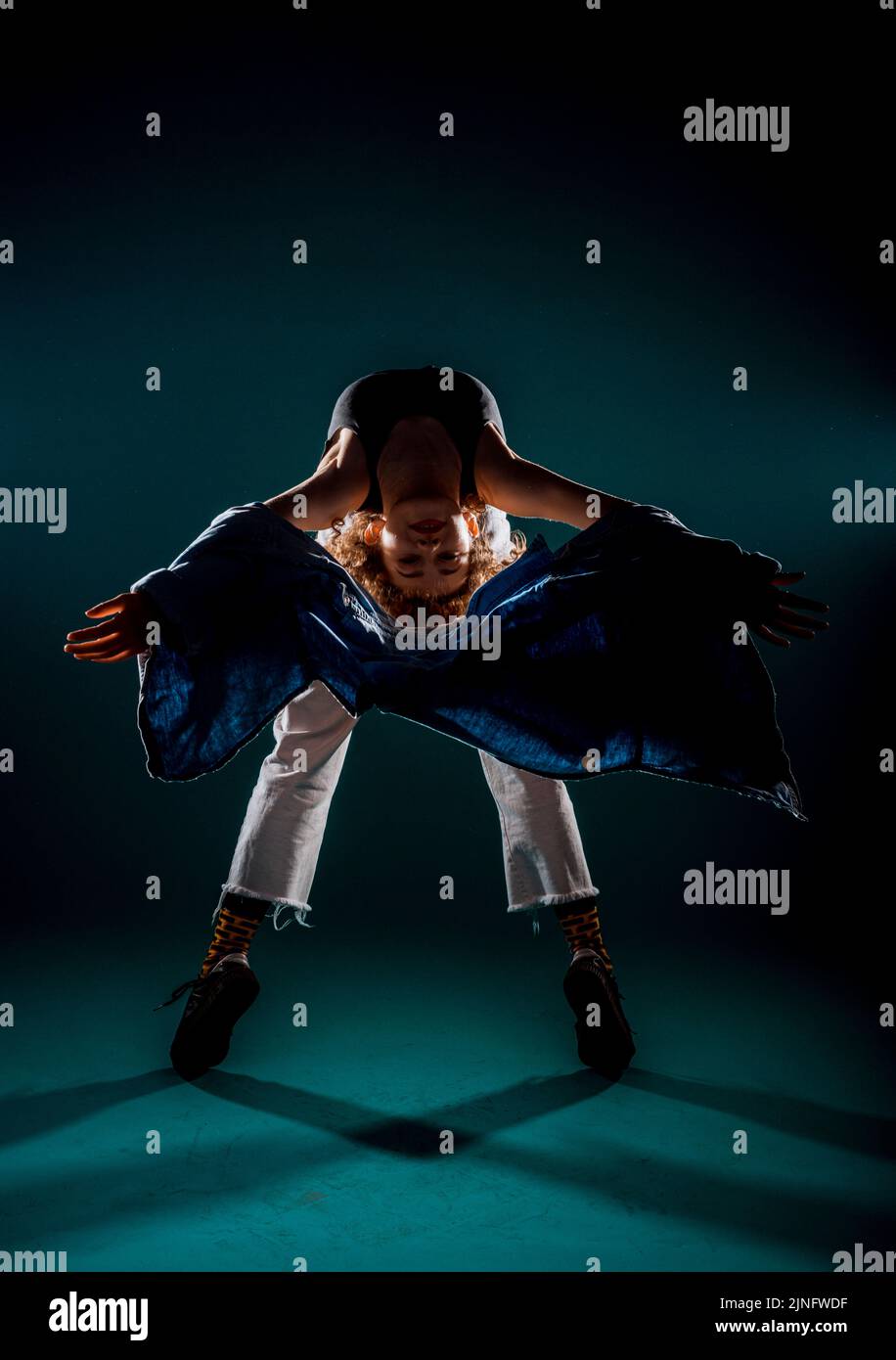 Female dance dancer exercising poses during a dance practice Stock ...