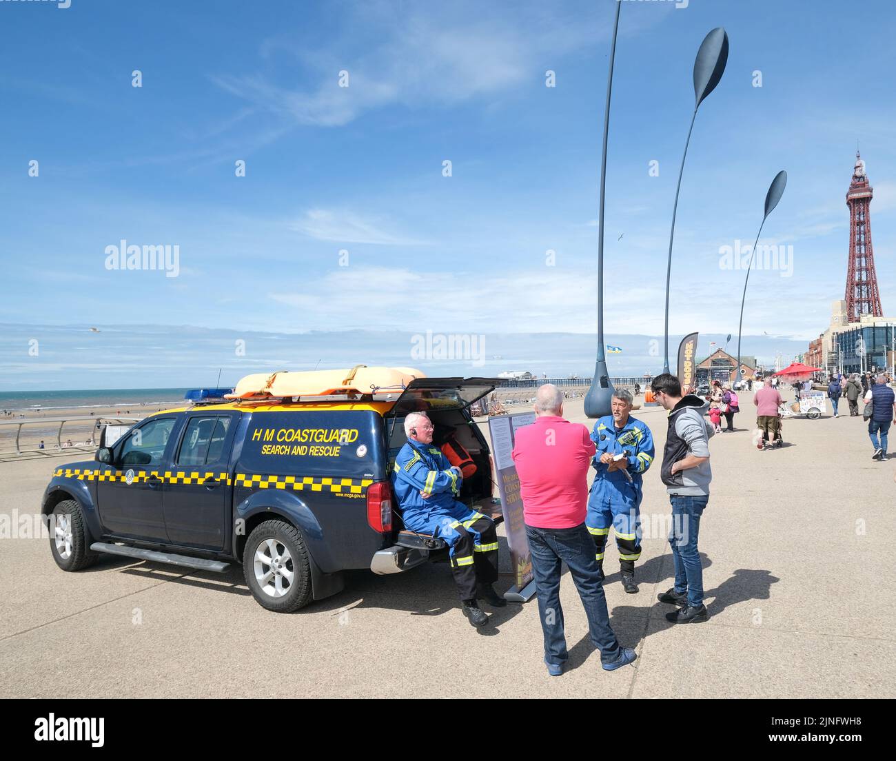 Blackpool, Lancashire, UK August 6 2022 The coastguard team discuss ...