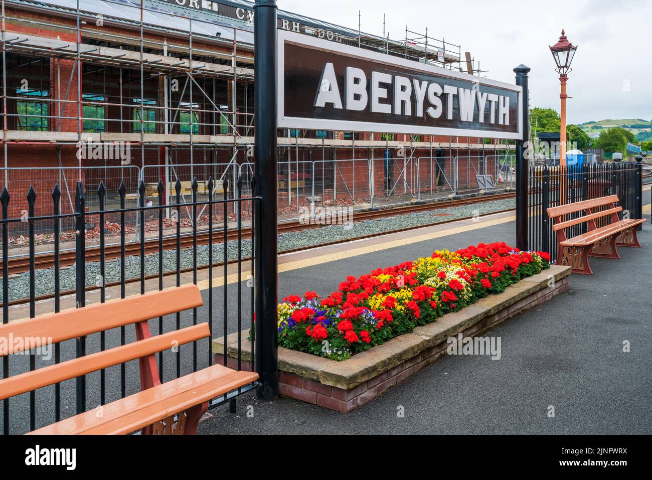 ABERYSTWYTH, WALES, UK - JULY 06, 2022: Aberystwyth train station sign ...