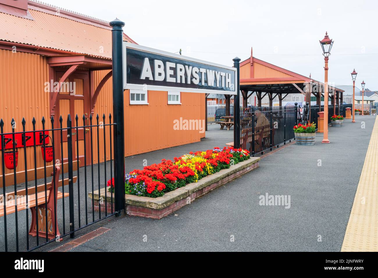 ABERYSTWYTH, WALES, UK - JULY 06, 2022: Aberystwyth train station sign ...