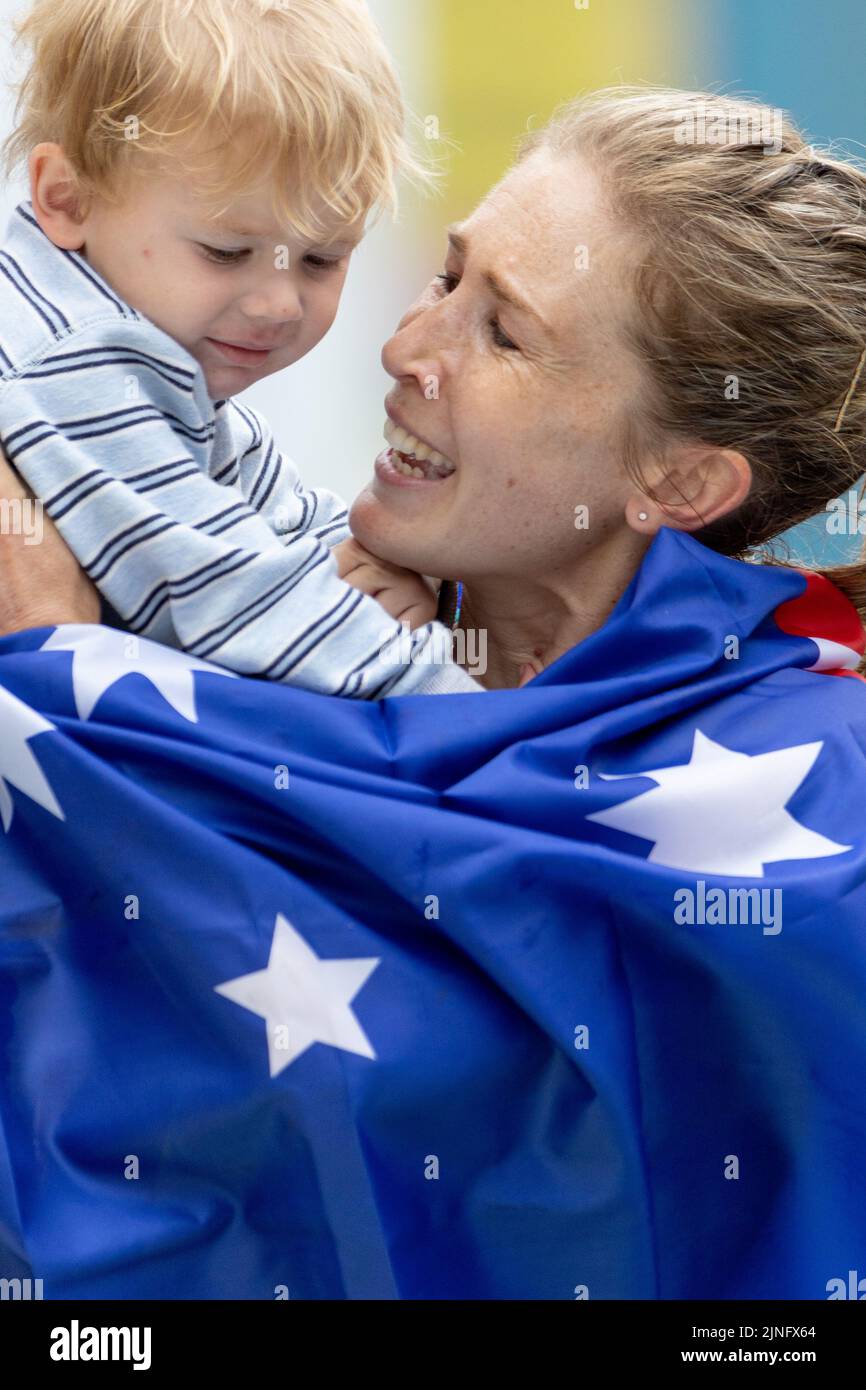 Jessica Stenson, Australia, celebrates with her son, Billy, following ...