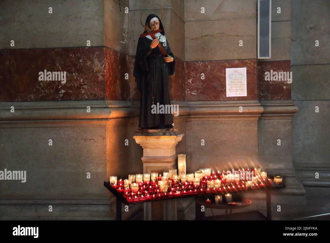 Votive Candles by Statue of Saint Caroline in Cathedrale Sainte-Marie ...